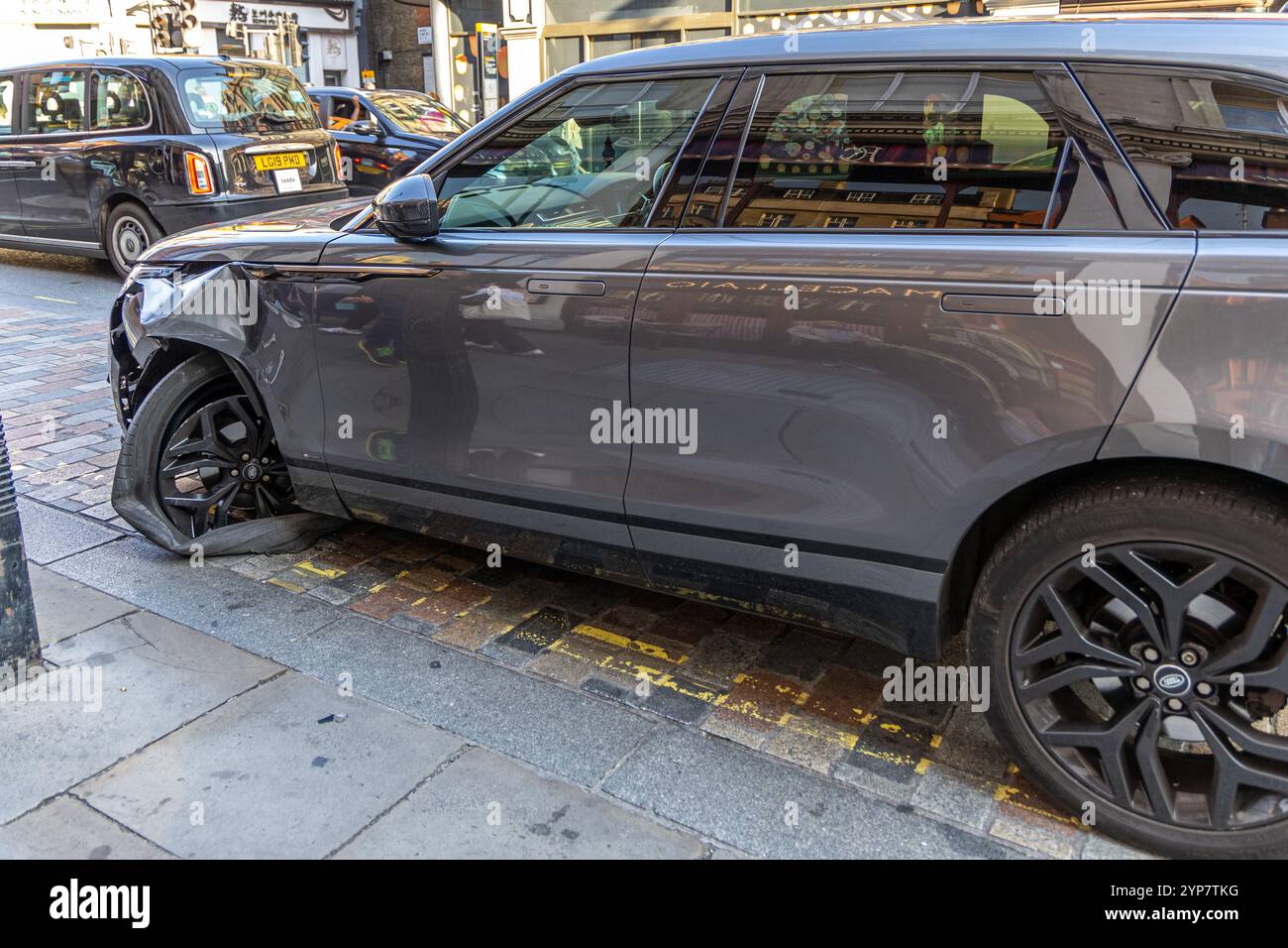 London, UK- September 19, 2024: Damaged Range Rover with significant ...