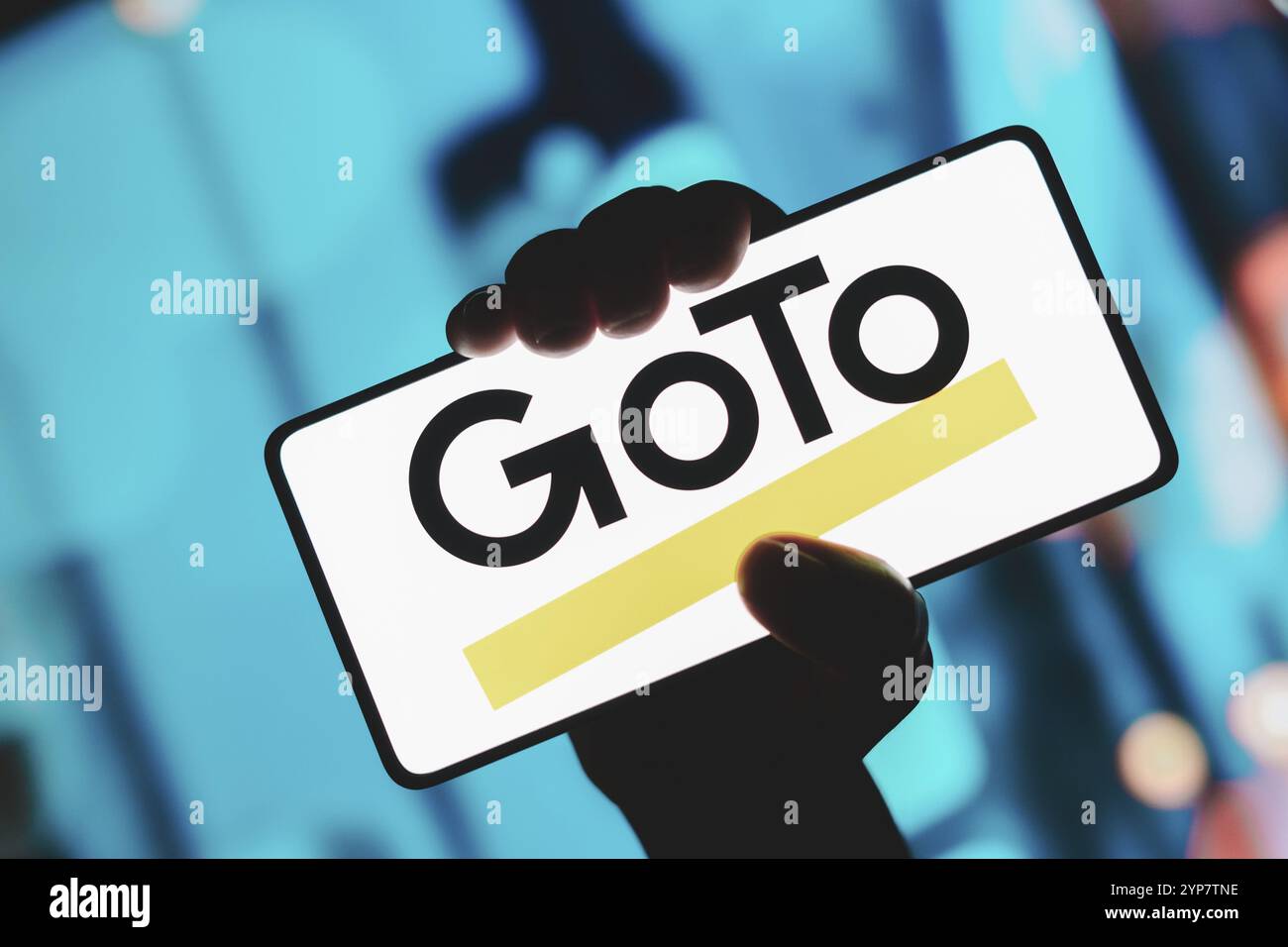 In this photo illustration, the GoTo Meeting logo is displayed on a ...