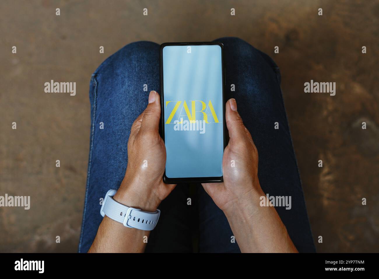 In this photo illustration, the Zara logo is displayed on a smartphone ...