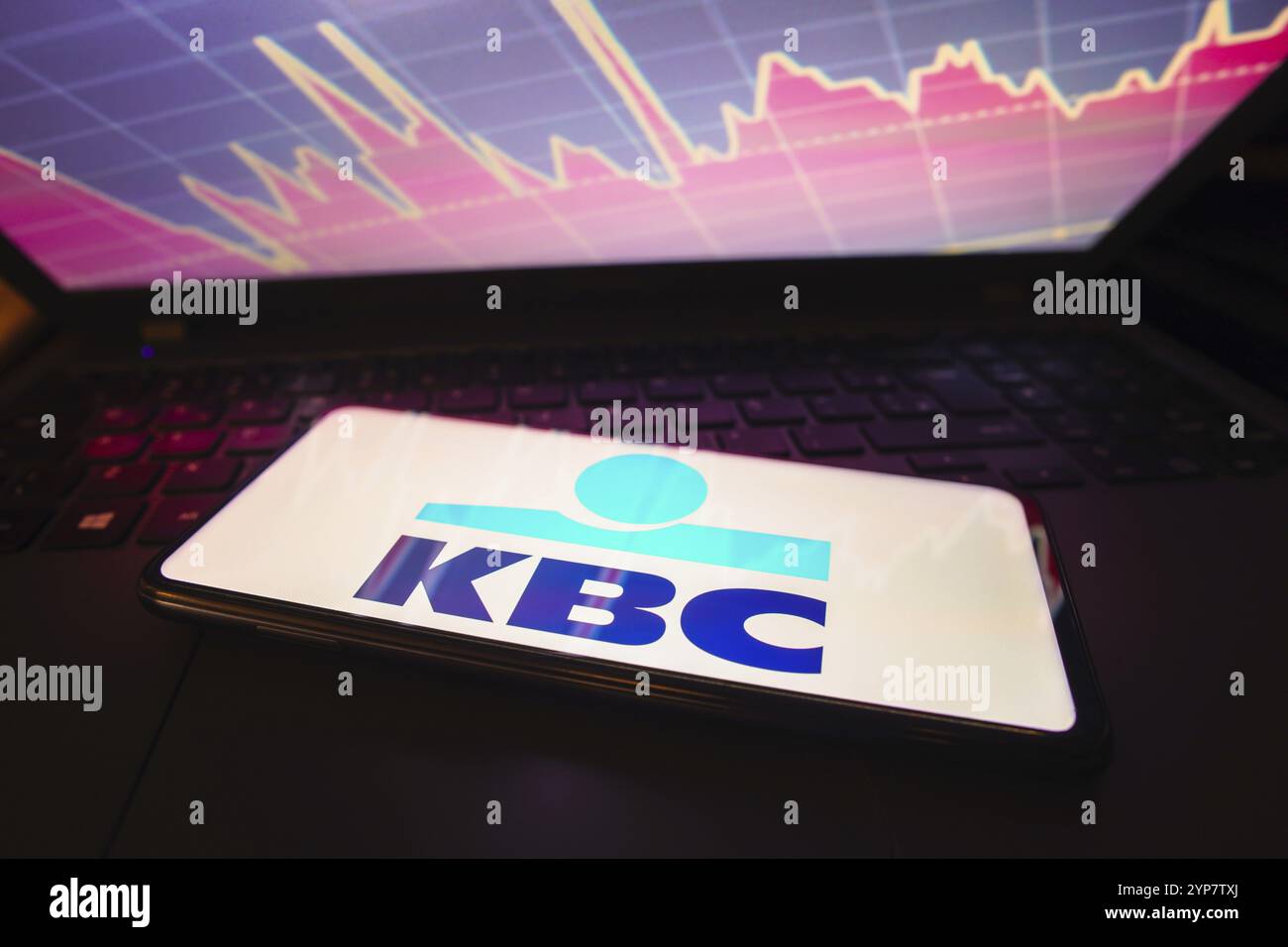 In this photo illustration the KBC Bank logo seen displayed on a ...