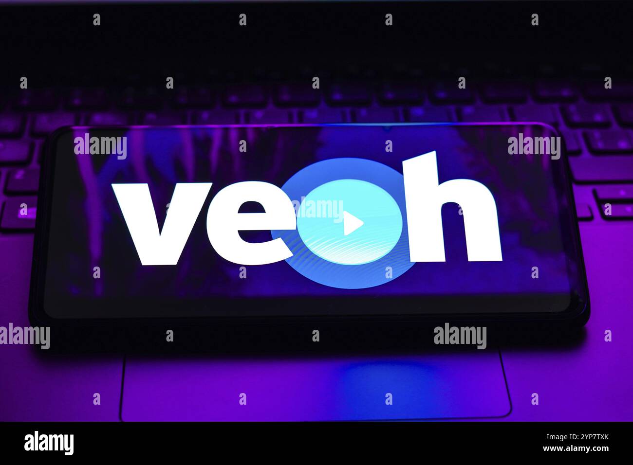 In this photo illustration, the Veoh logo is displayed on a smartphone ...
