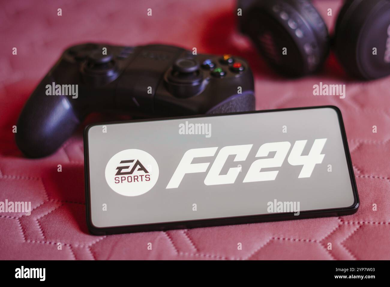 In this photo illustration, the EA SPORTS FC 24 logo is displayed on a ...