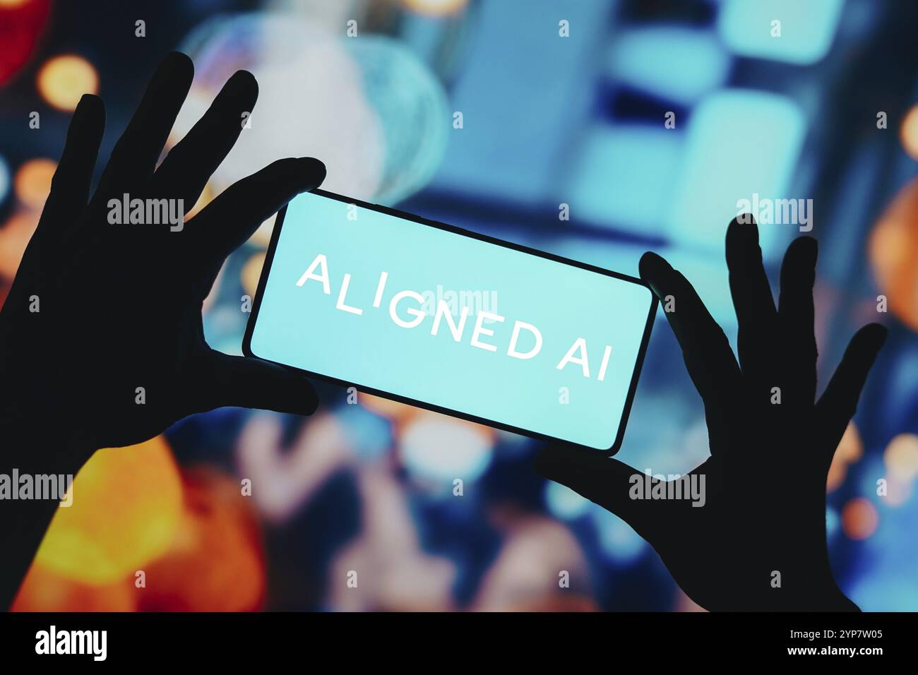 In this photo illustration, the Aligned AI logo is displayed on a smartphone screen Stock Photo ...