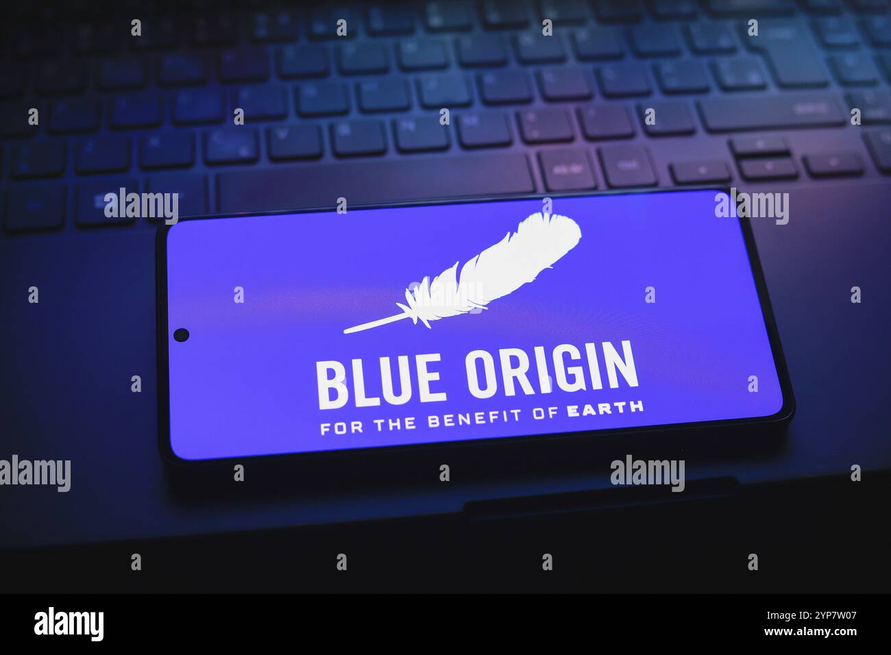 In this photo illustration, the Blue Origin logo is displayed on a ...