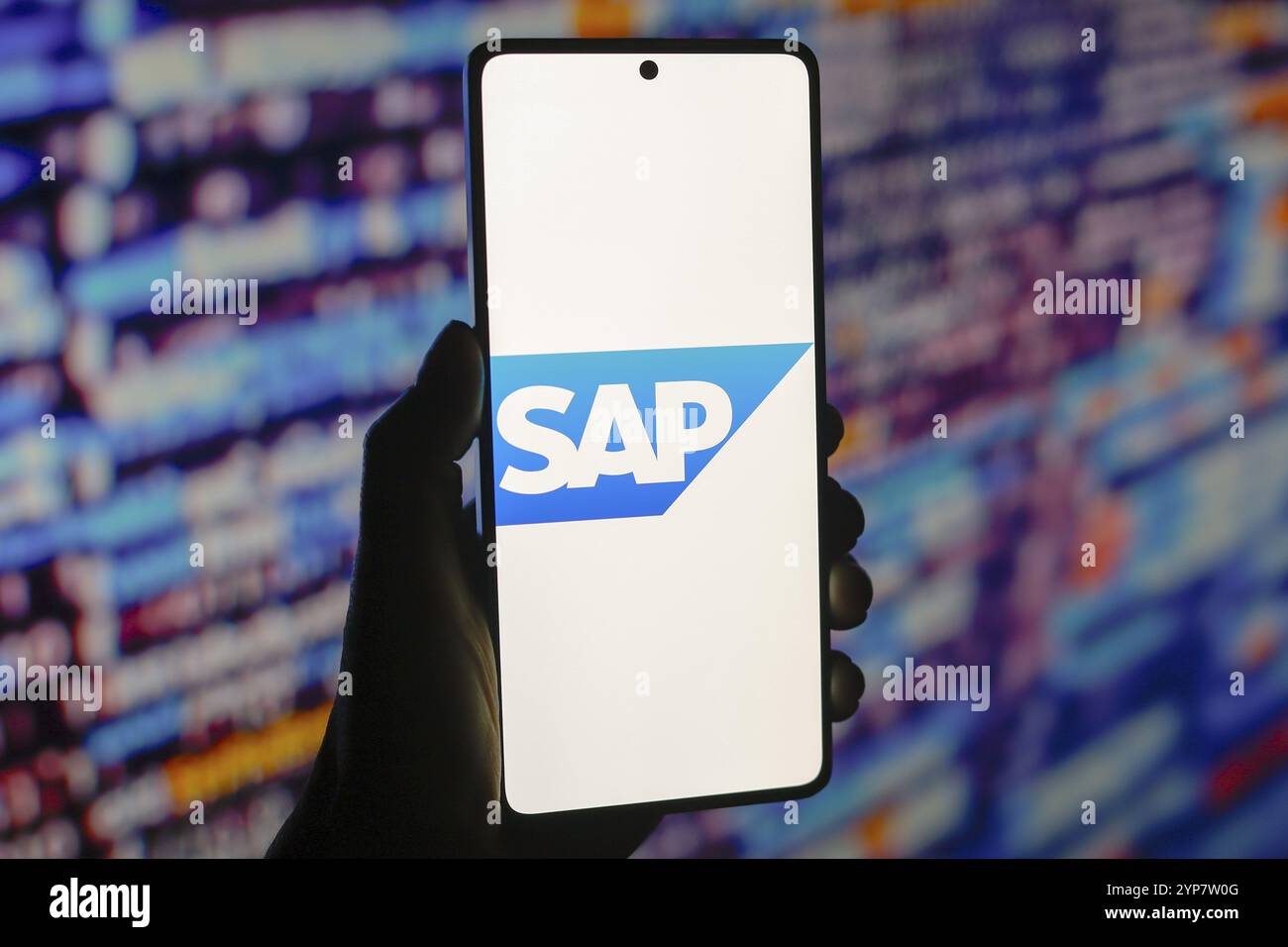 In this photo illustration, the SAP logo is displayed on a smartphone ...