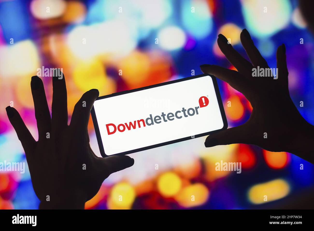 In this photo illustration, the Downdetector logo is displayed on a ...