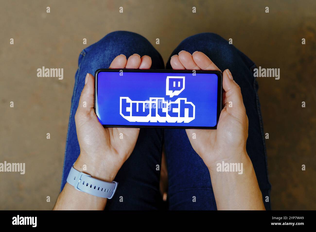 In this photo illustration, the Twitch logo is displayed on a ...