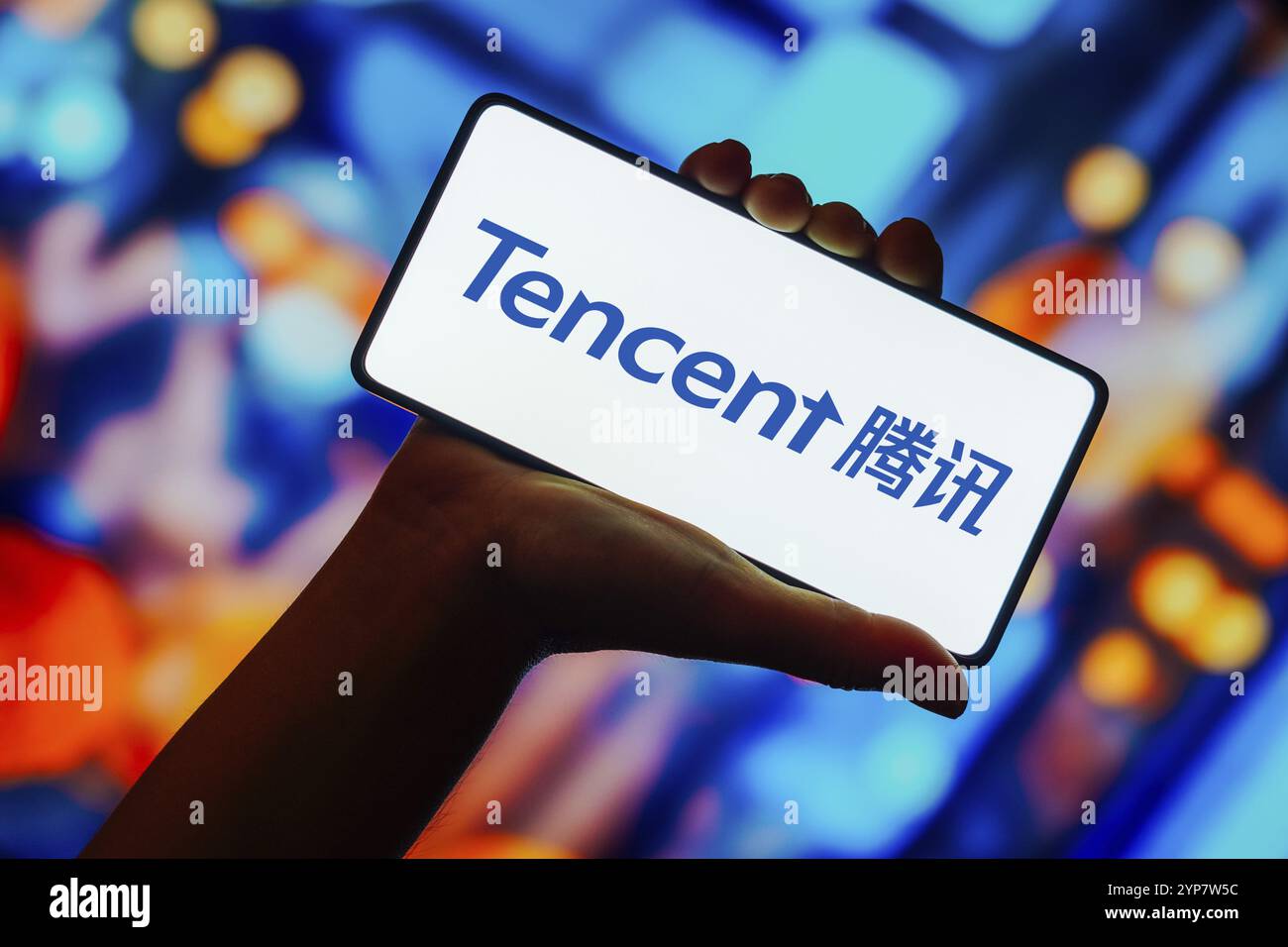 In this photo illustration, the Tencent logo is displayed on a ...