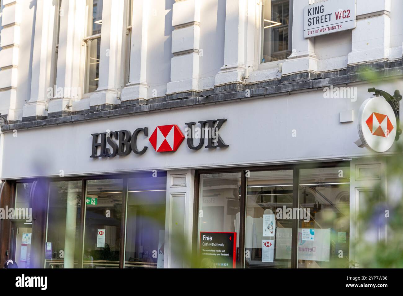 London, UK- September 19, 2024: The logo and brand sign of HSBC bank. HSBC Holdings plc is a ...