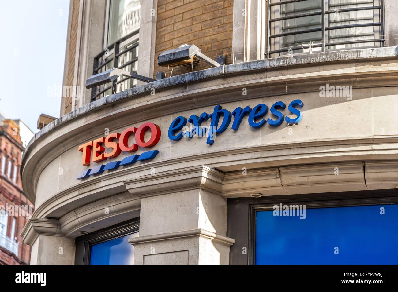 London, UK- September 19, 2024: Tesco Express sign logo and facade ...