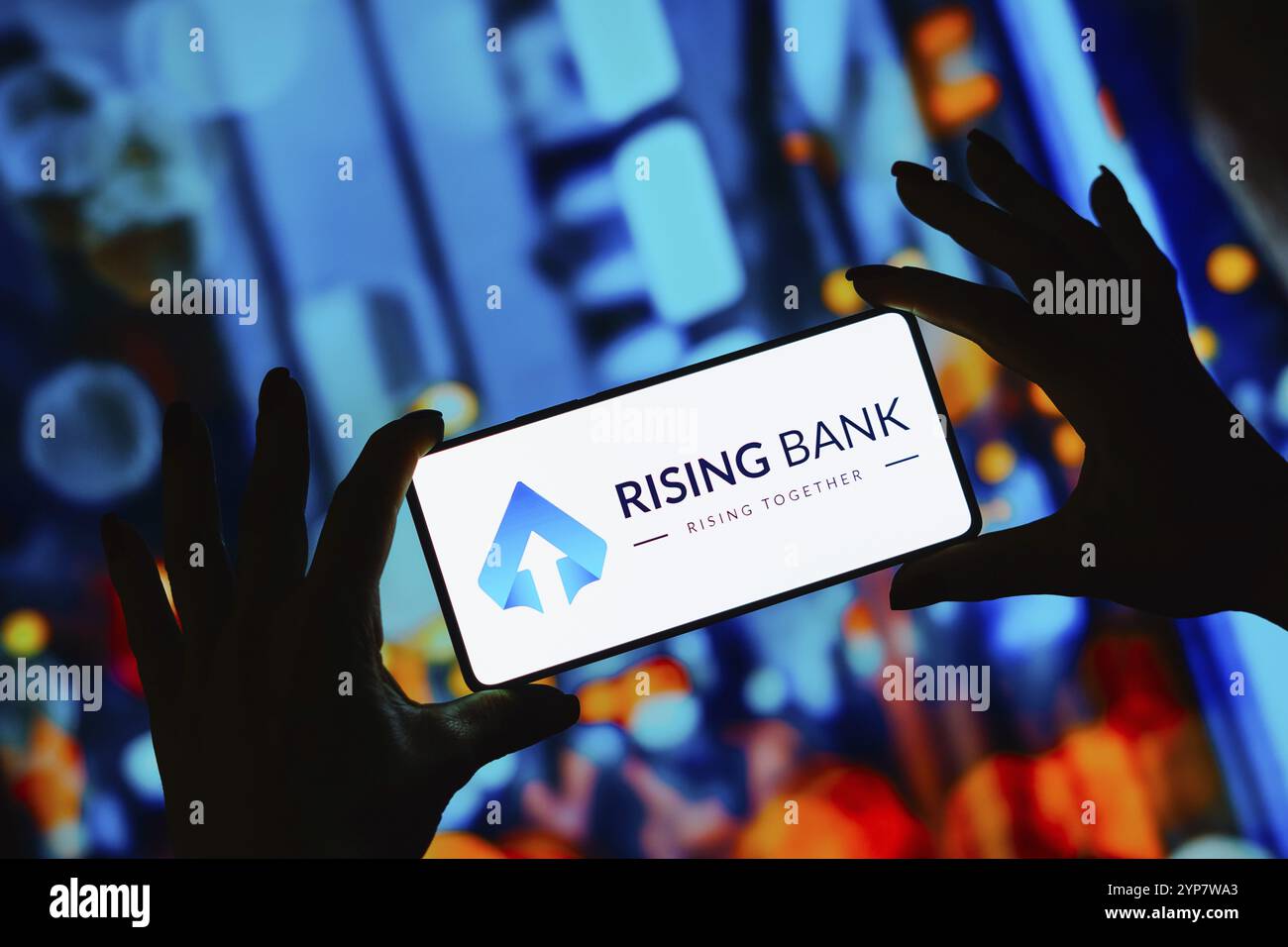In this photo illustration, the Rising Bank logo is displayed on a ...