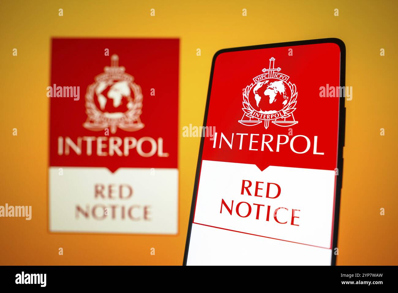 In this photo illustration, the Interpol Red Notice logo is displayed ...