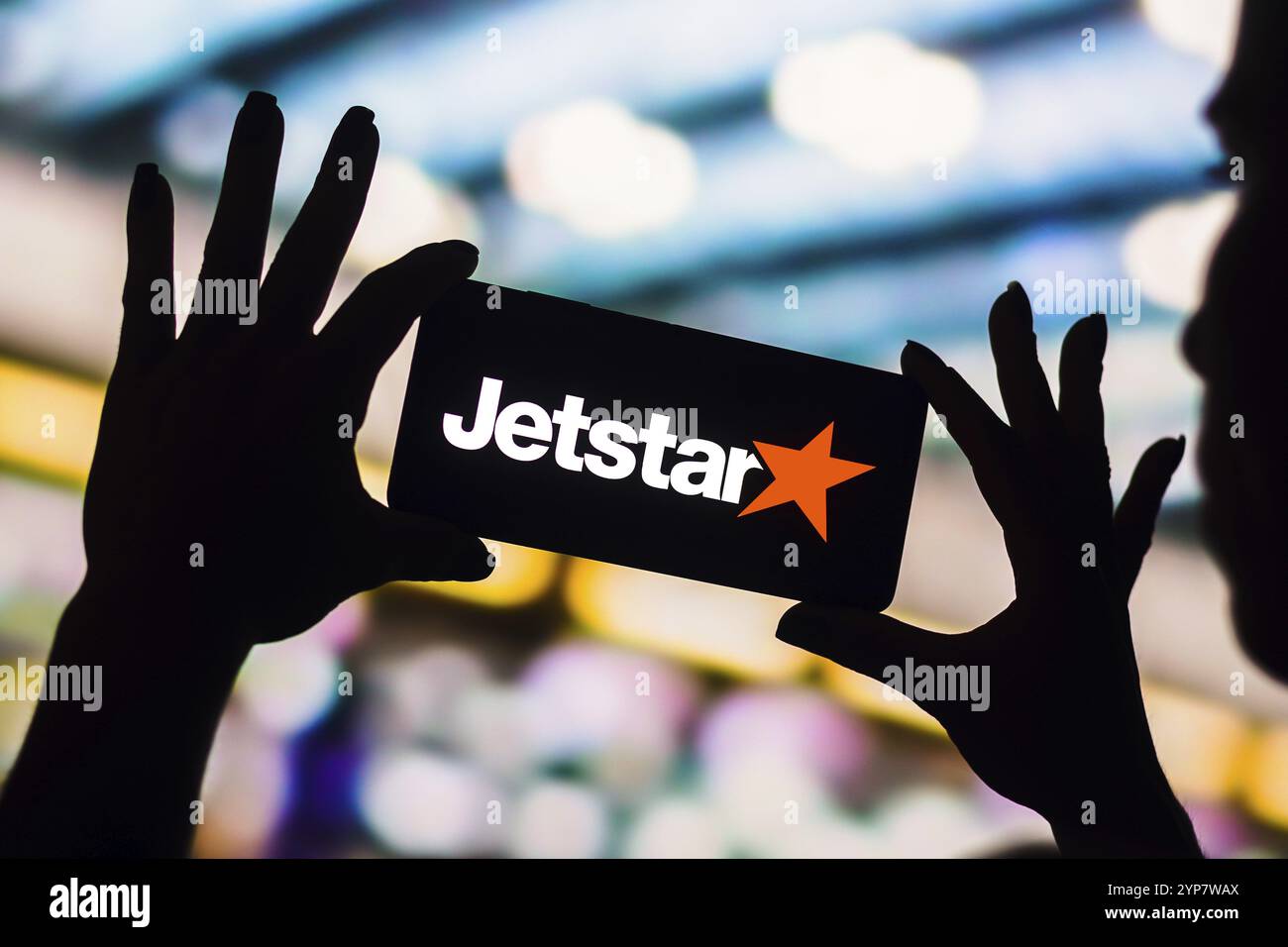 In this photo illustration, the Jetstar Airways logo is displayed on a ...