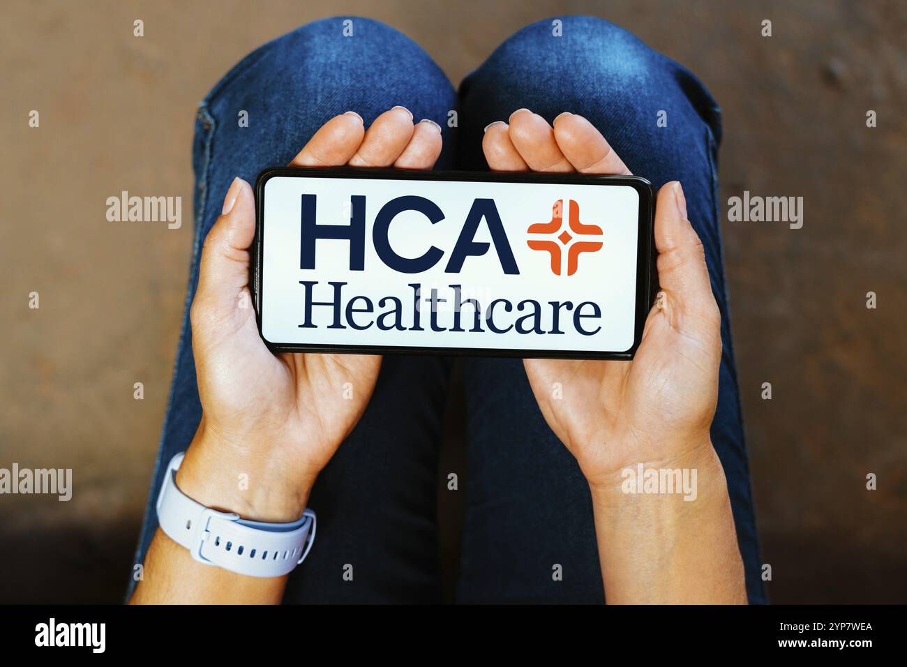 In this photo illustration, the HCA Healthcare logo is displayed on a ...