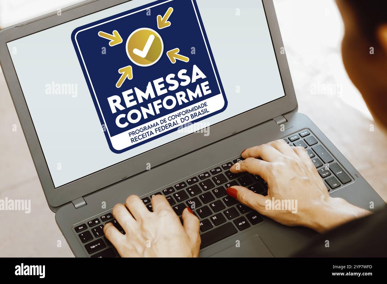 In this photo illustration, the Remessa Conforme logo is displayed on a ...