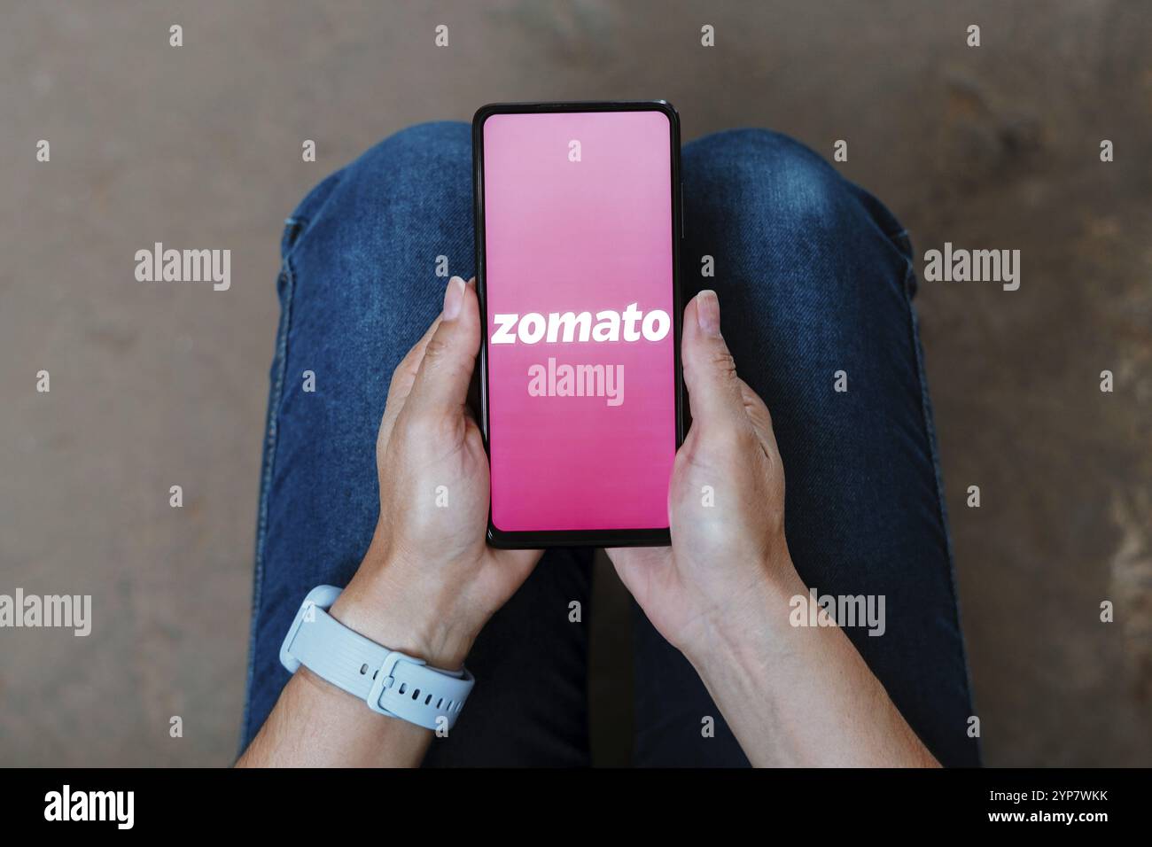 In this photo illustration, the Zomato logo seen displayed on a ...