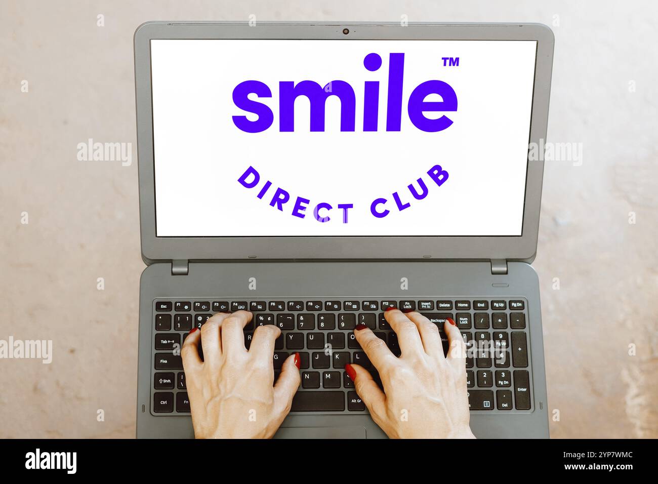 In this photo illustration, the SmileDirectClub logo is displayed on a ...