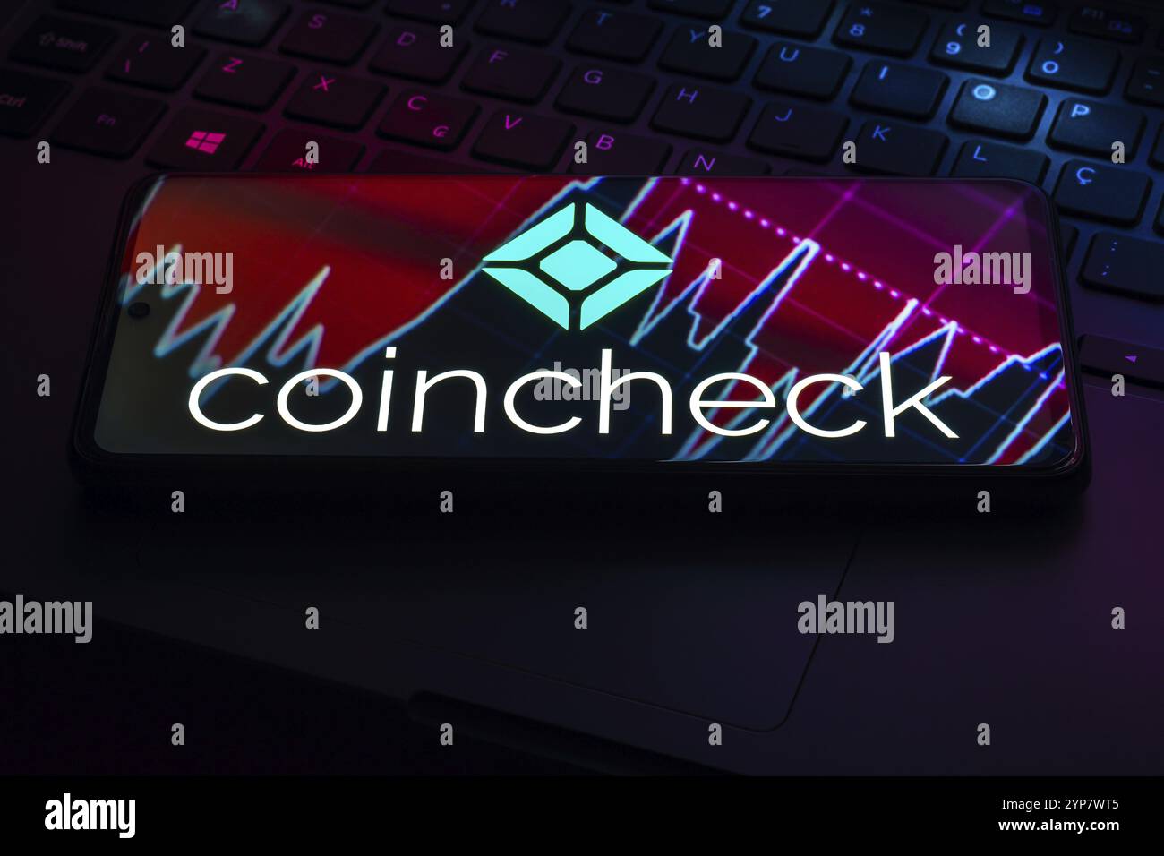 In this photo illustration, the Coincheck logo is seen displayed on a smartphone Stock Photo - Alamy