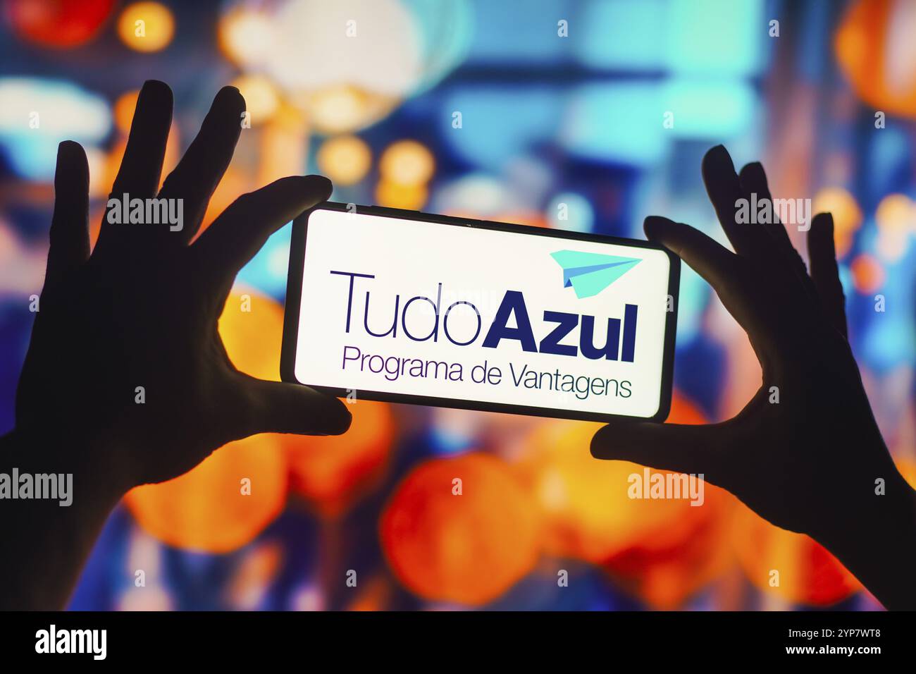 In this photo illustration, the Tudo Azul logo is displayed on a ...