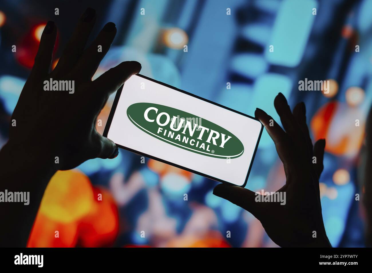 In this photo illustration, the COUNTRY Financial logo is displayed on ...