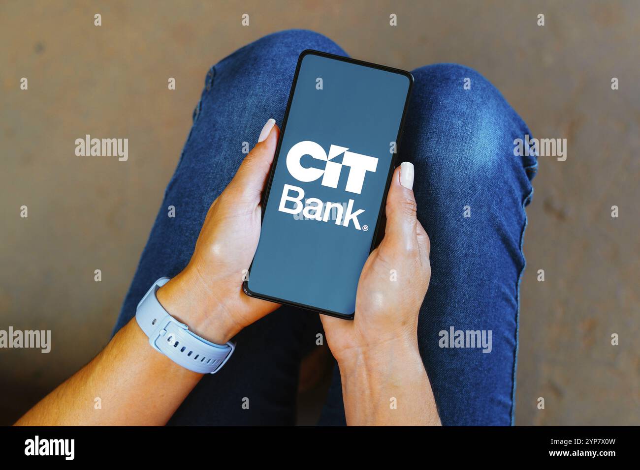 In this photo illustration, the CIT Bank logo is displayed on a ...