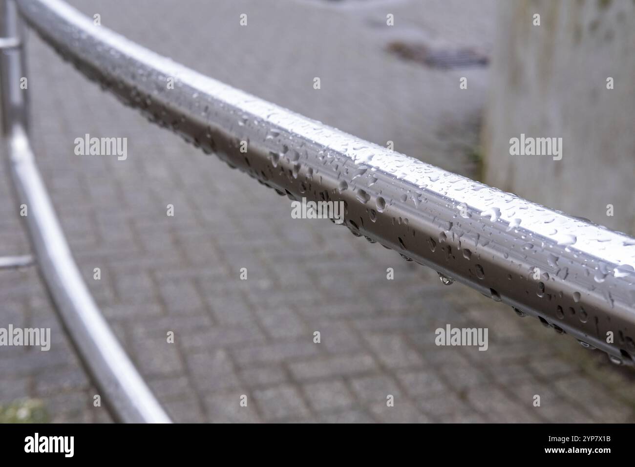 Stainless steel railing in the rain Stock Photo - Alamy