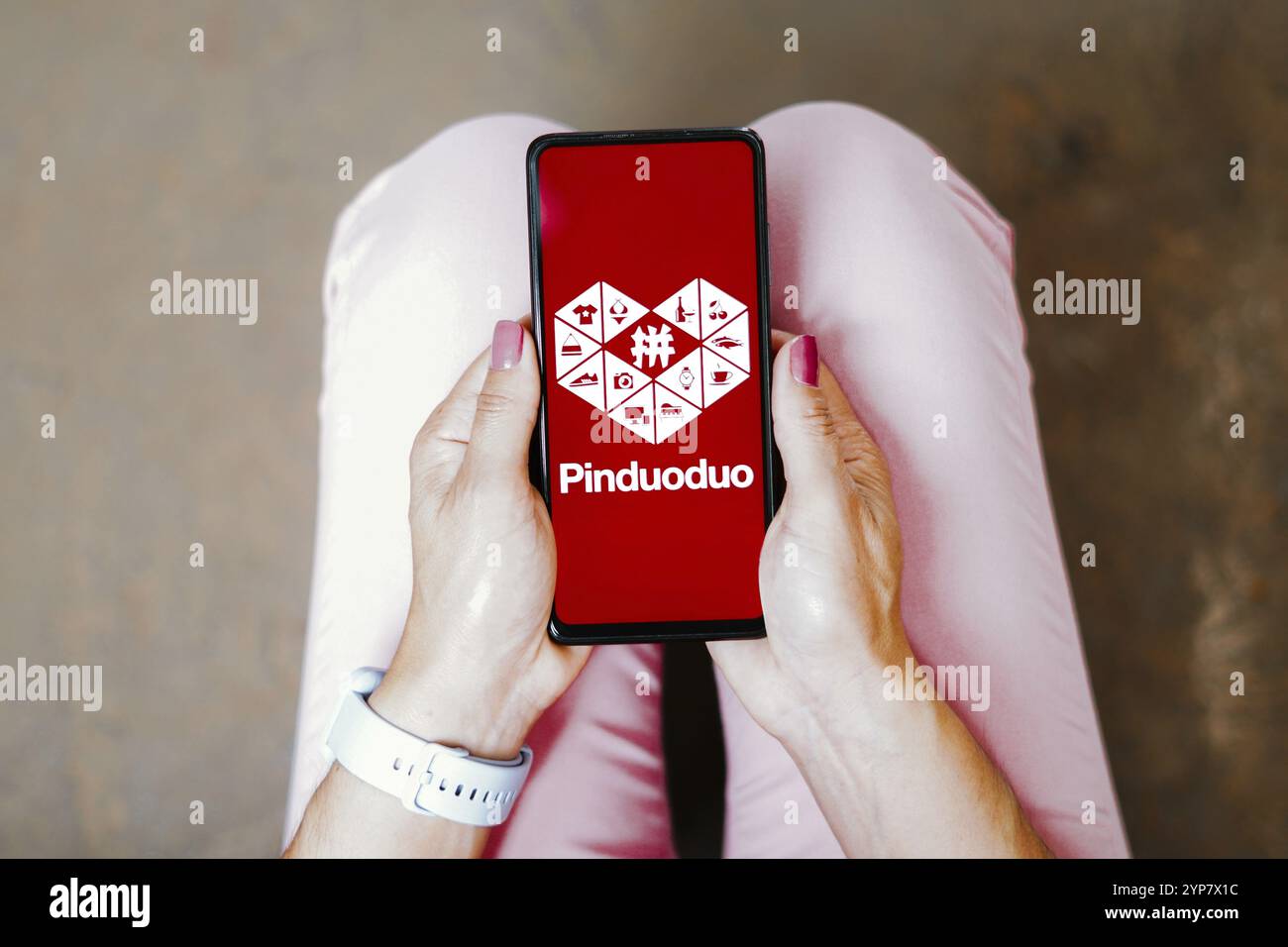 In this photo illustration, the Pinduoduo logo app is seen displayed on ...