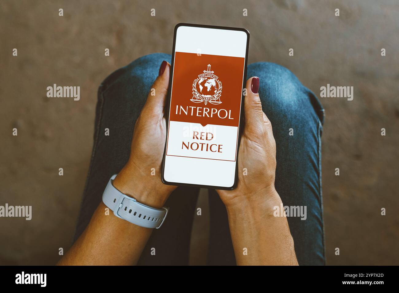 In this photo illustration, the Interpol Red Notice logo is displayed ...