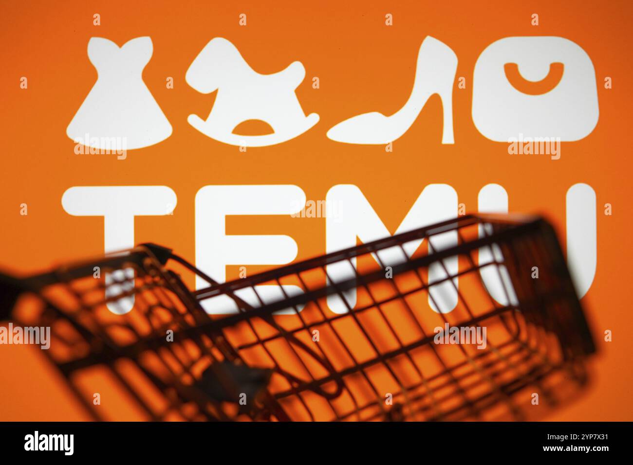 In this photo illustration, the Temu logo seen displayed on a ...