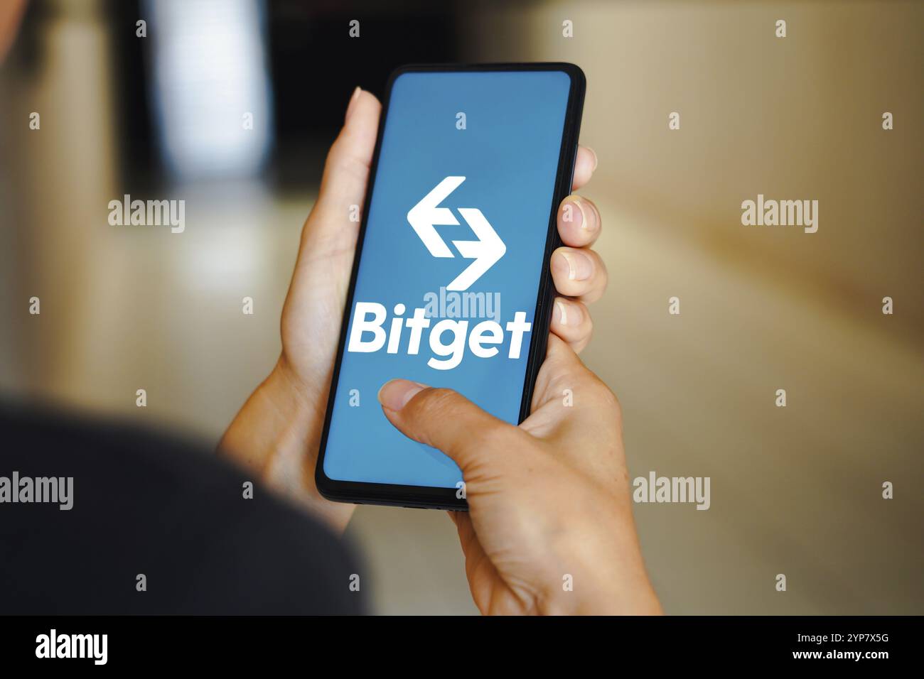 In this photo illustration, the Bitget logo is seen displayed on a ...