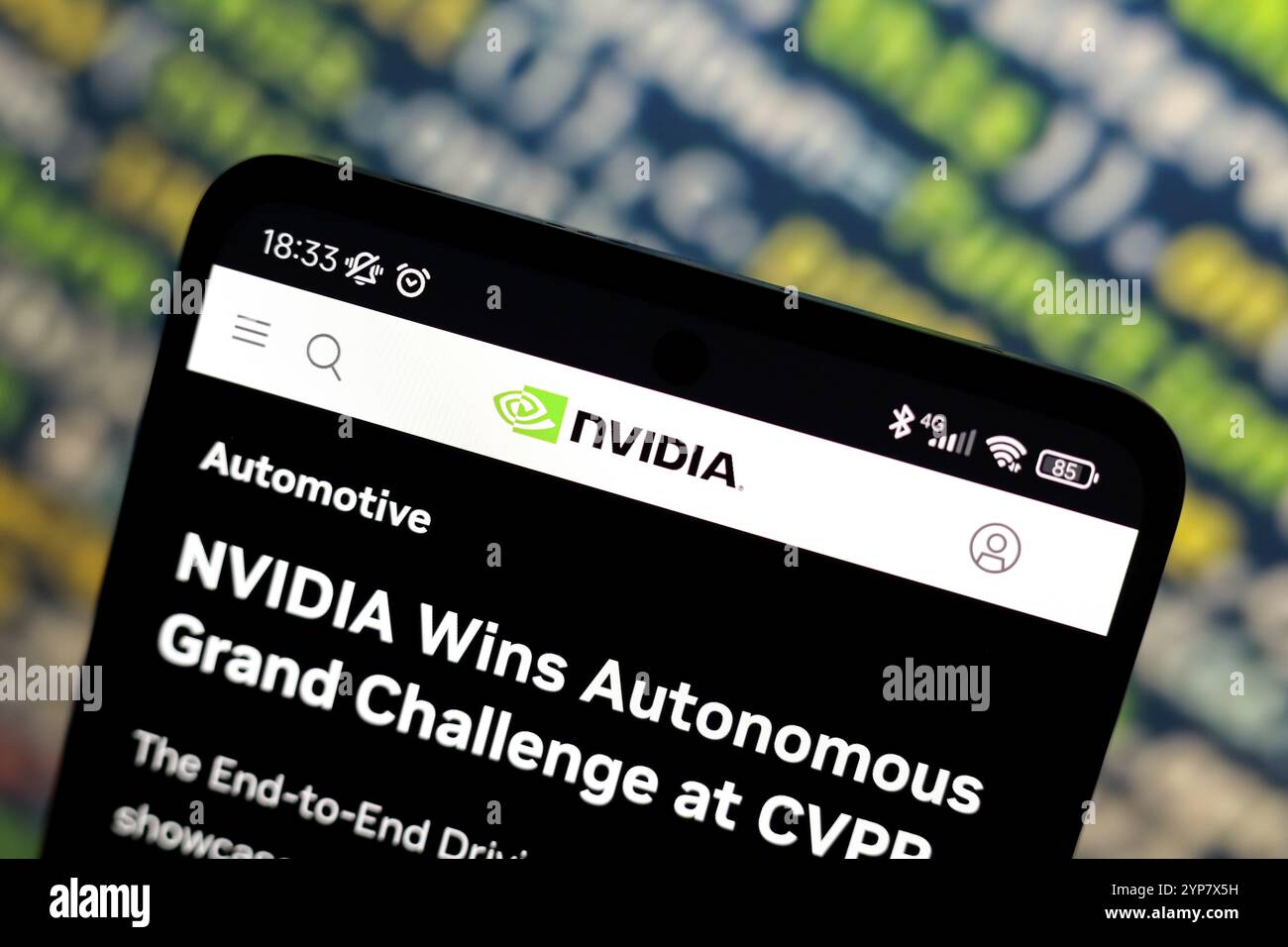 In this photo illustration, the Nvidia logo is displayed on the website ...