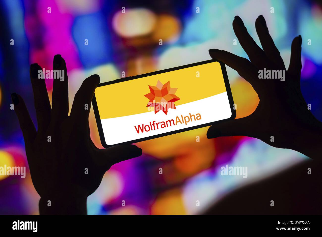 In this photo illustration, the Wolfram Alpha logo is displayed on a ...