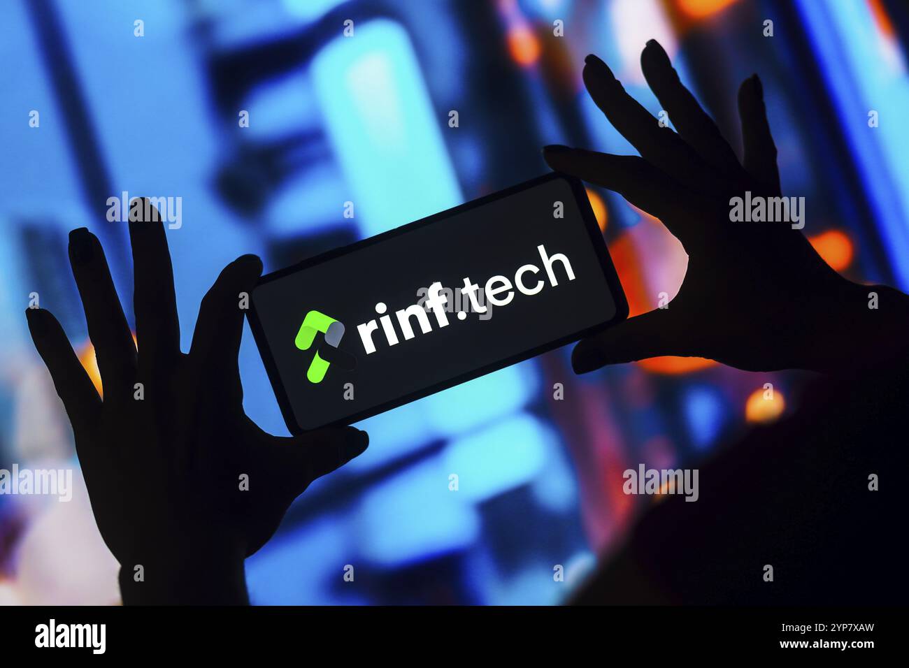 In this photo illustration, the Rinf Tech logo is displayed on a smartphone screen Stock Photo ...