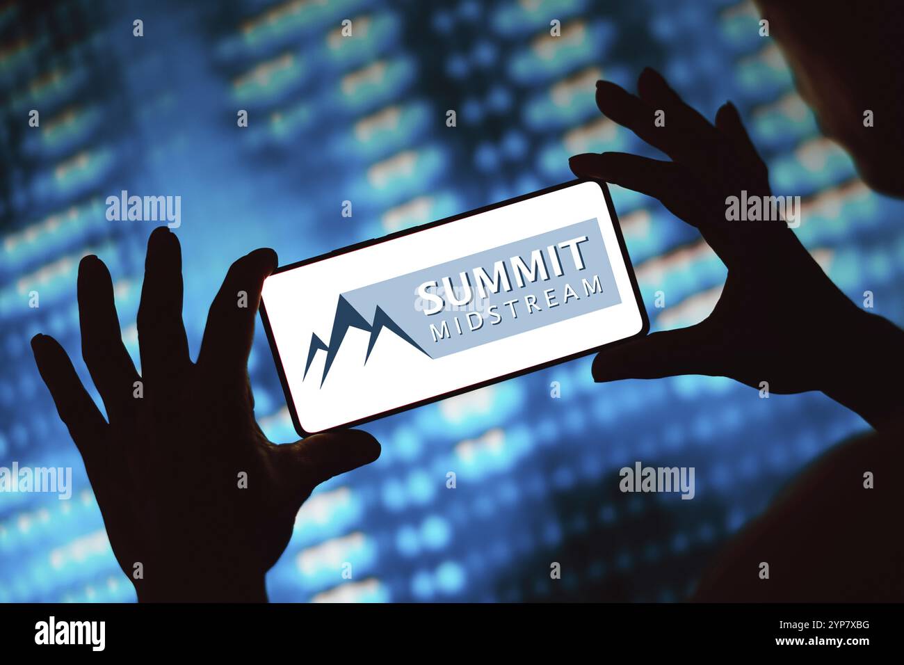 In this photo illustration, the Summit Midstream Partners logo is ...