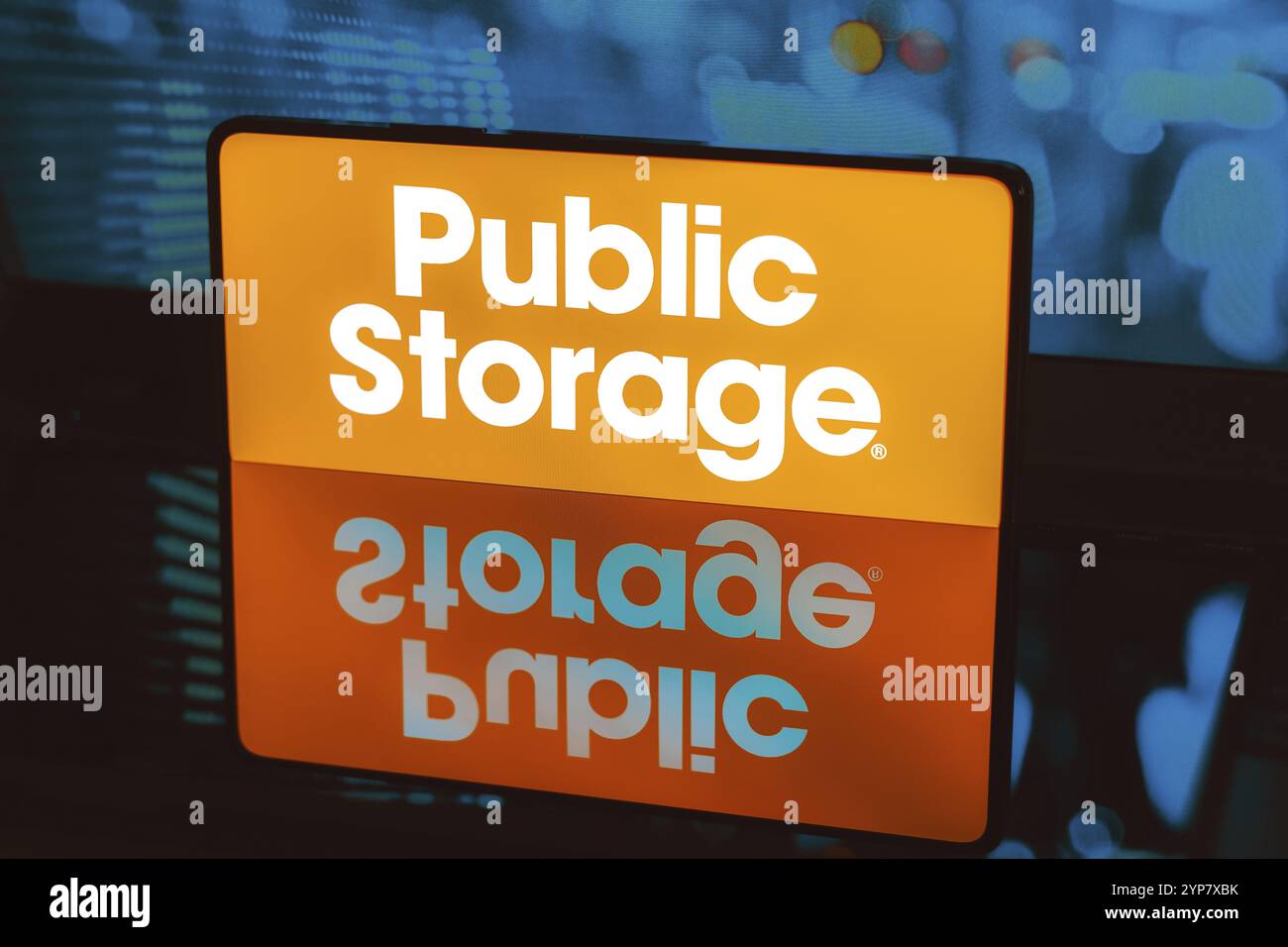 In this photo illustration, the Public Storage logo is displayed on a ...