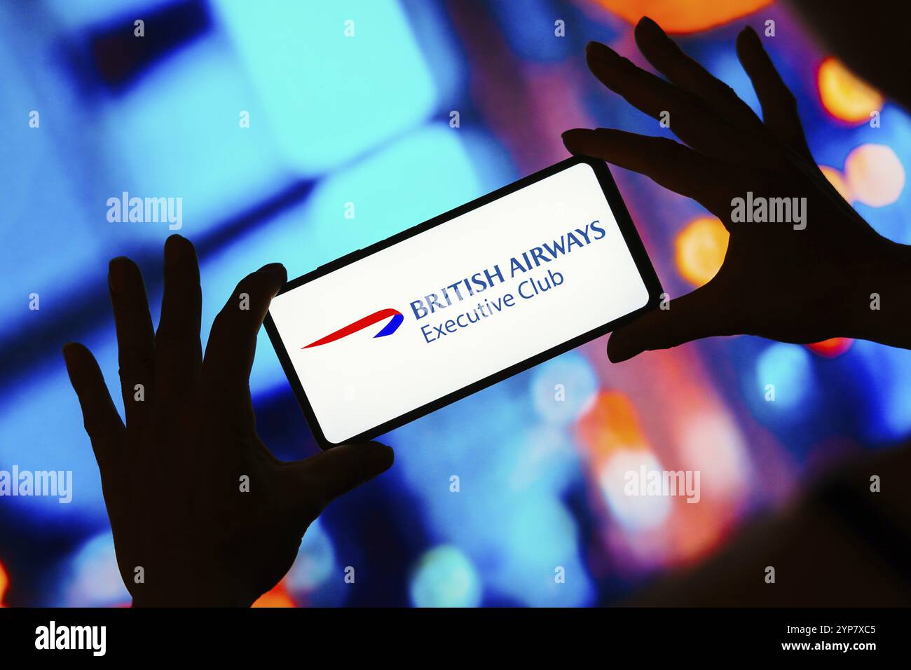In this photo illustration, the British Airways Executive Club logo ...