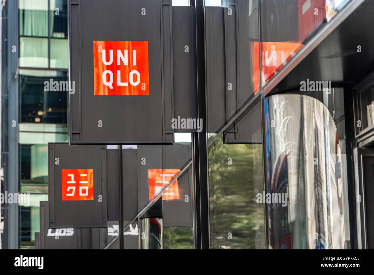 London, UK- September 19, 2024: Uniqlo store sign displayed in a shop ...