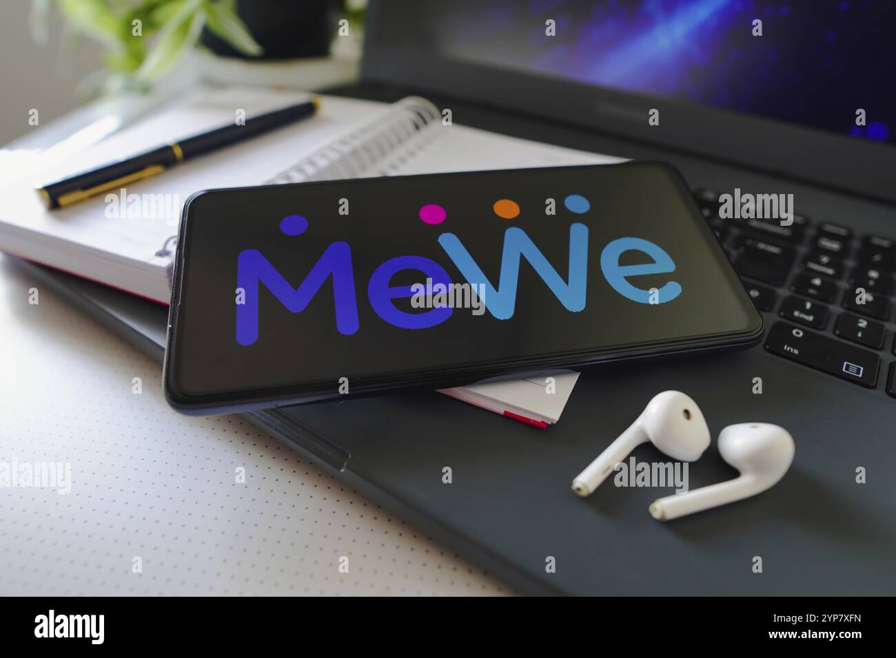 In this photo illustration, the MeWe logo is displayed on a smartphone ...