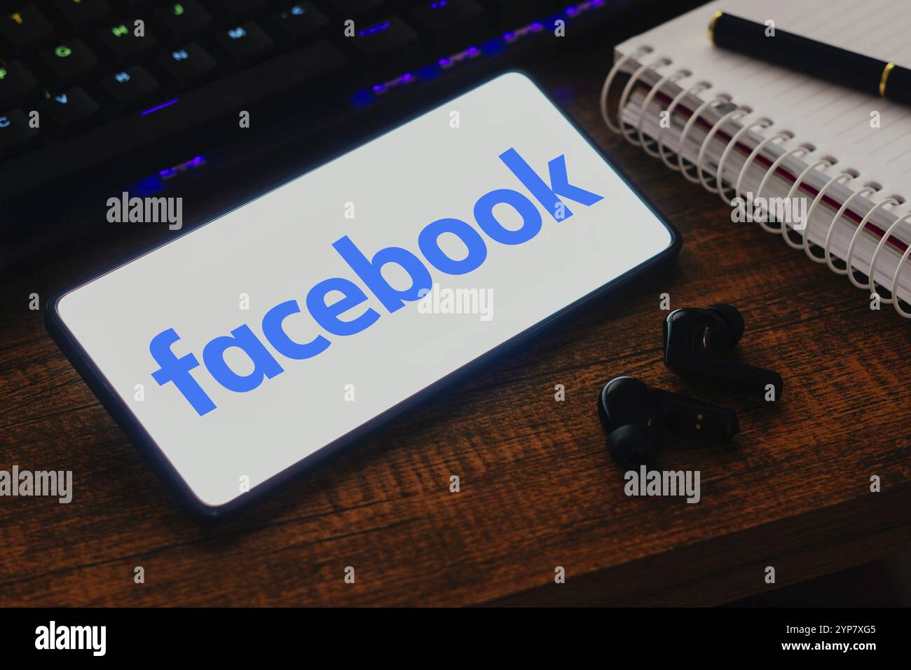 In this photo illustration, the Facebook logo is displayed on a ...