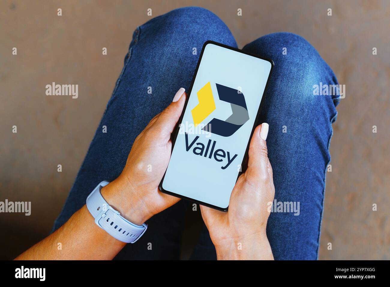 In this photo illustration, the Valley Bank logo is displayed on a ...