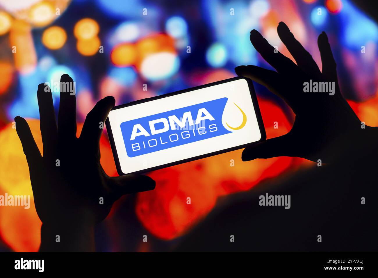 In this photo illustration, the ADMA Biologics logo is displayed on a ...