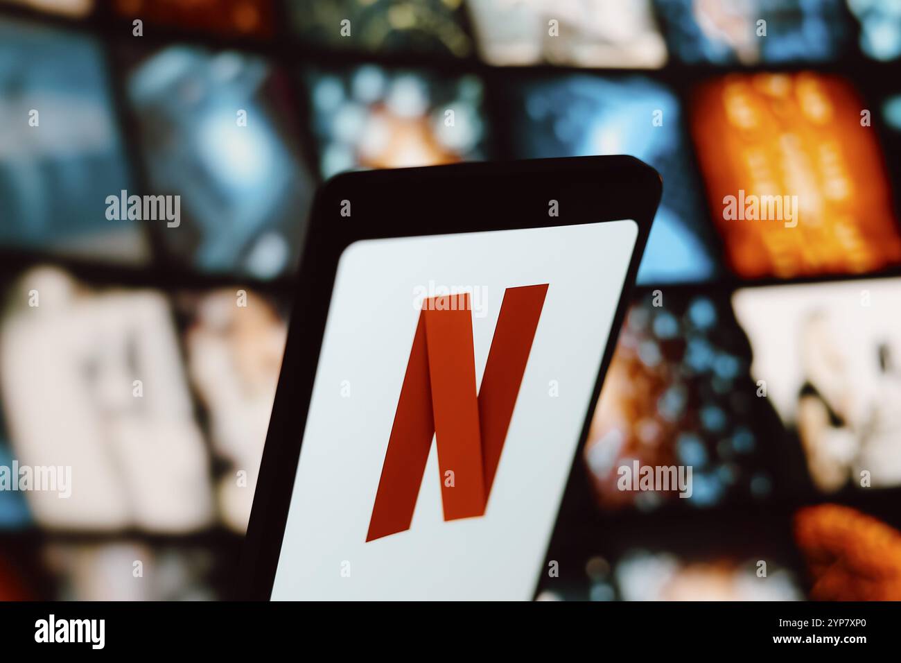 In this photo illustration, the Netflix logo is displayed on a ...