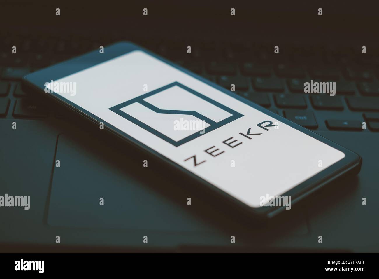 In this photo illustration, the Zeekr logo is displayed on a smartphone ...