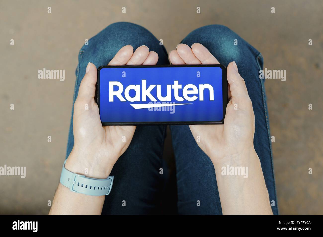 In this photo illustration, the Rakuten logo is displayed on a ...