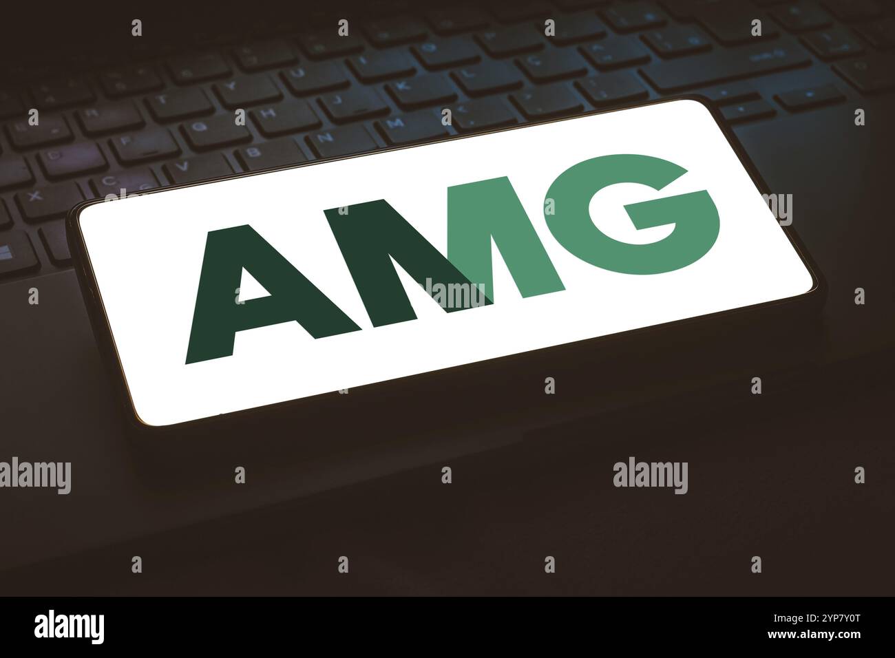 In this photo illustration, the Affiliated Managers Group (AMG) logo is ...