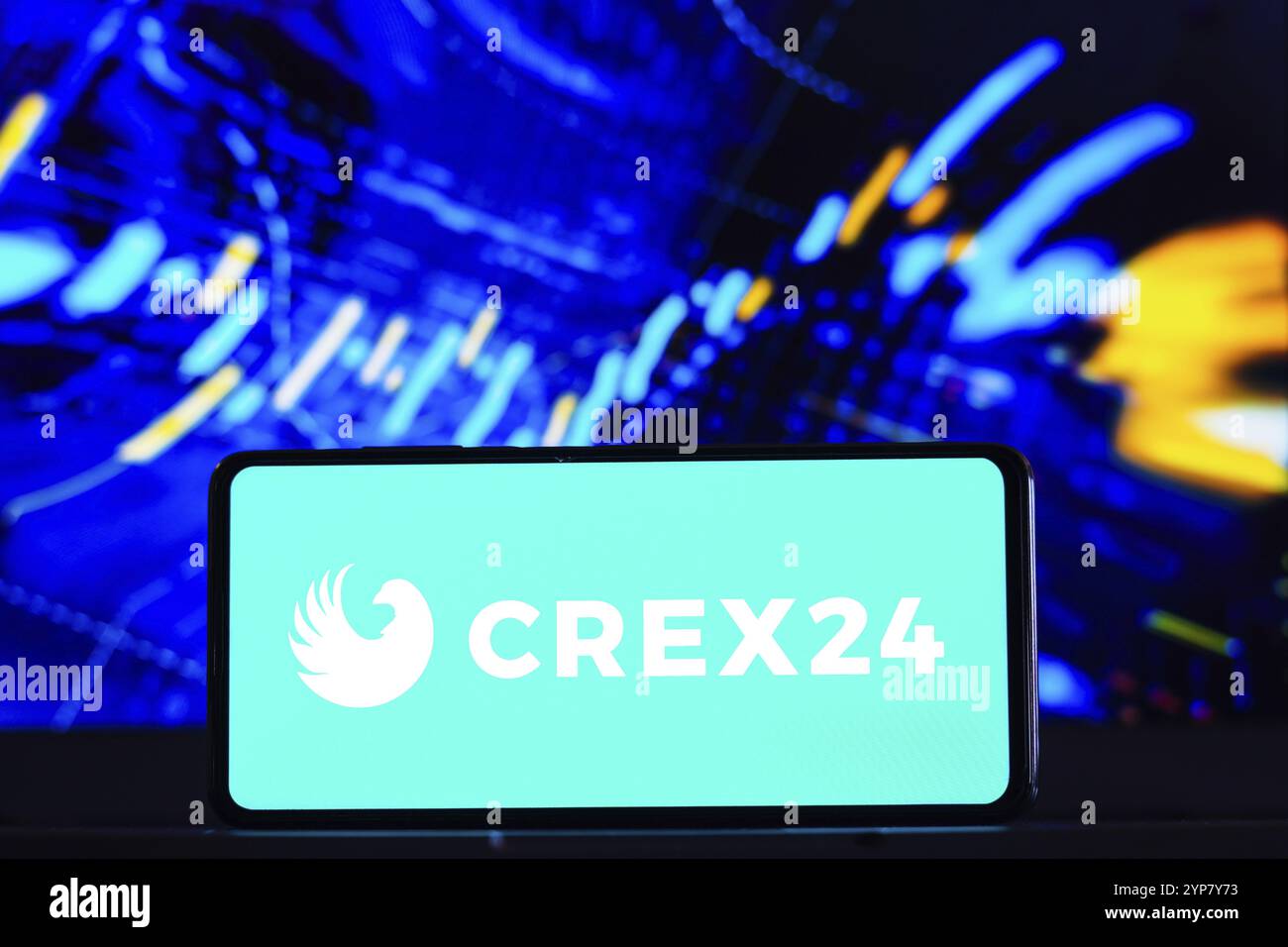 In this photo illustration, the Crex24 Exchange logo seen displayed on a smartphone Stock Photo ...