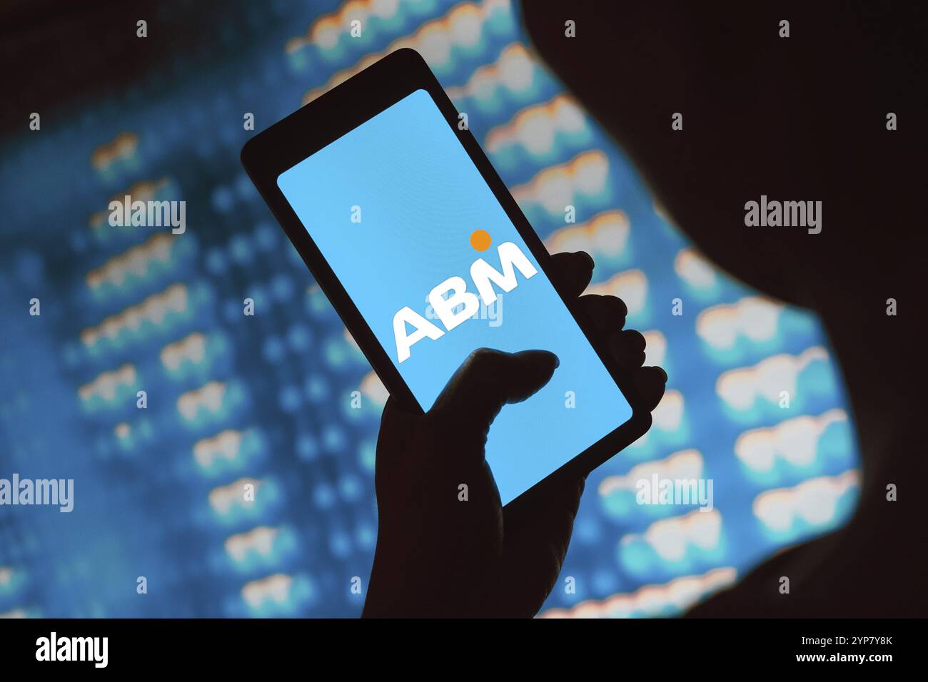 In this photo illustration, the ABM Industries Incorporated logo is displayed on a smartphone ...