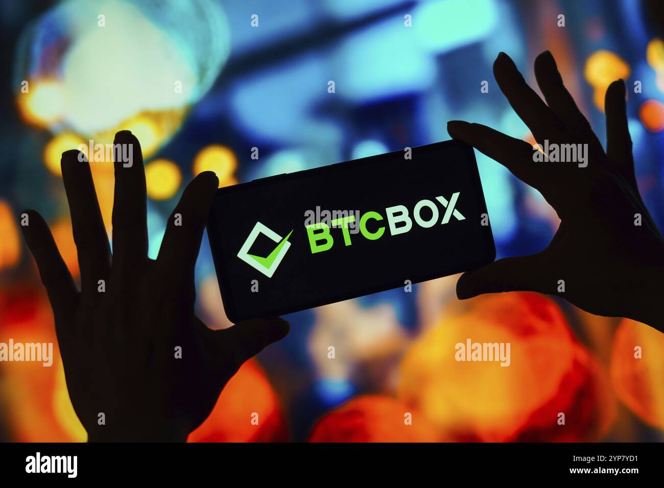 In this photo illustration, the BTCBOX logo seen displayed on a smartphone Stock Photo - Alamy