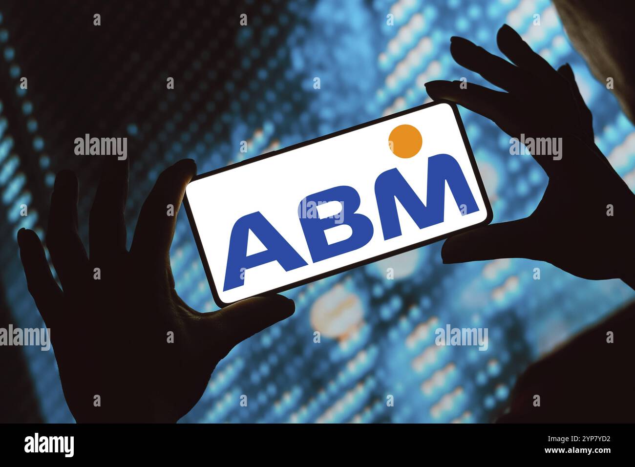 In this photo illustration, the ABM Industries Incorporated logo is displayed on a smartphone ...