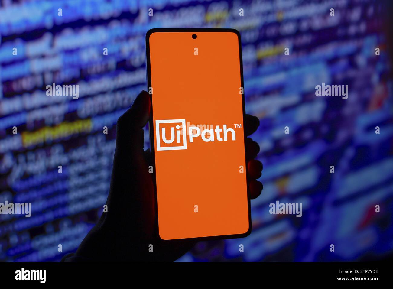 In this photo illustration, the UiPath logo is displayed on a ...